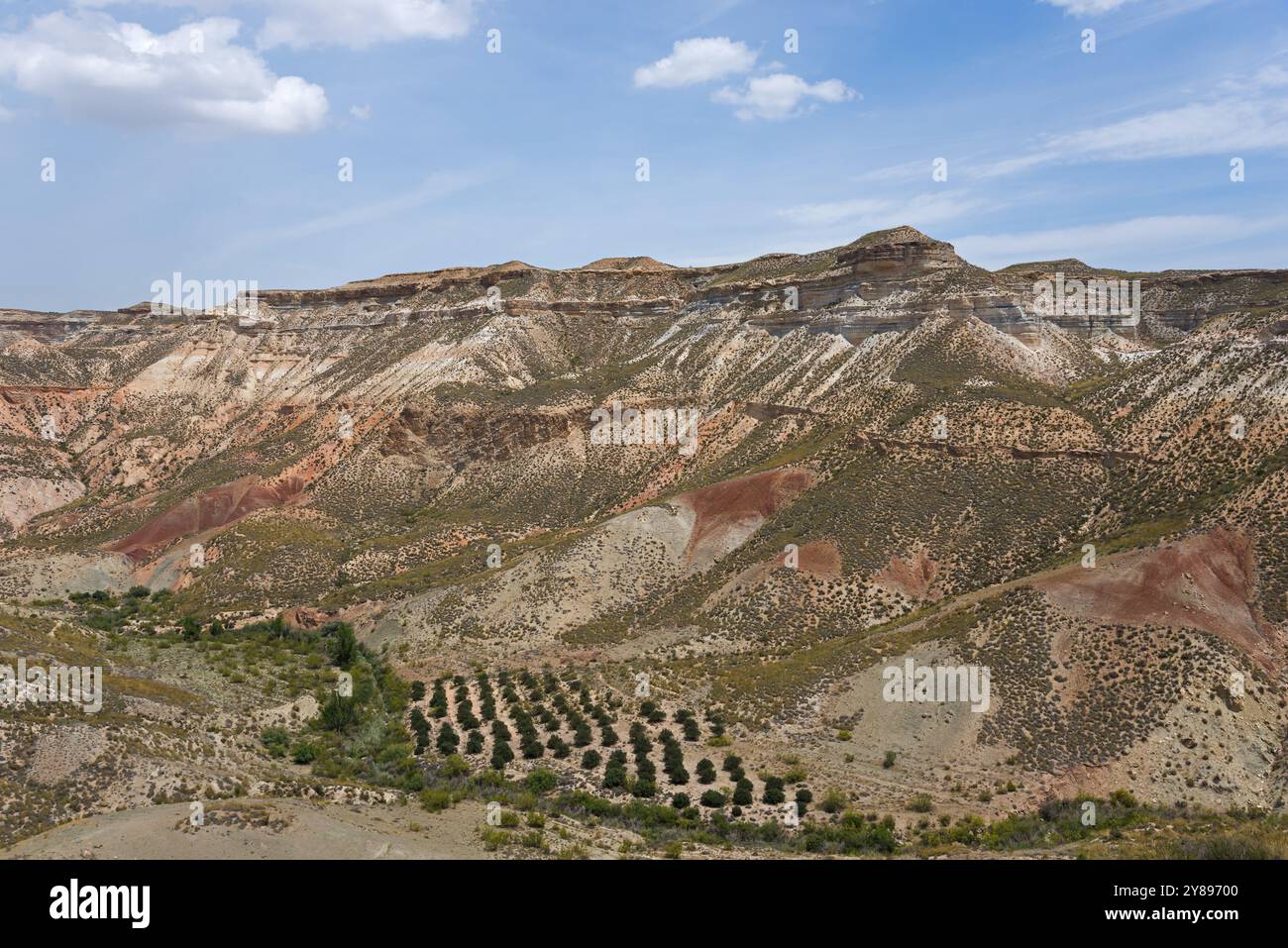 Erosion landscape with different colour layers in an arid environment ...