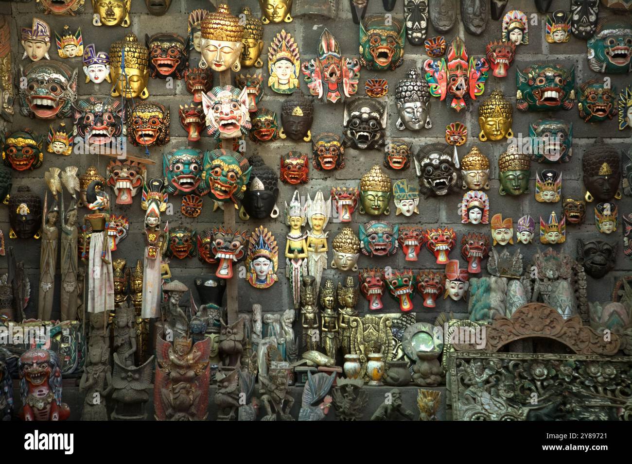 Decorative Balinese masks and sculptural artwork being displayed in ...