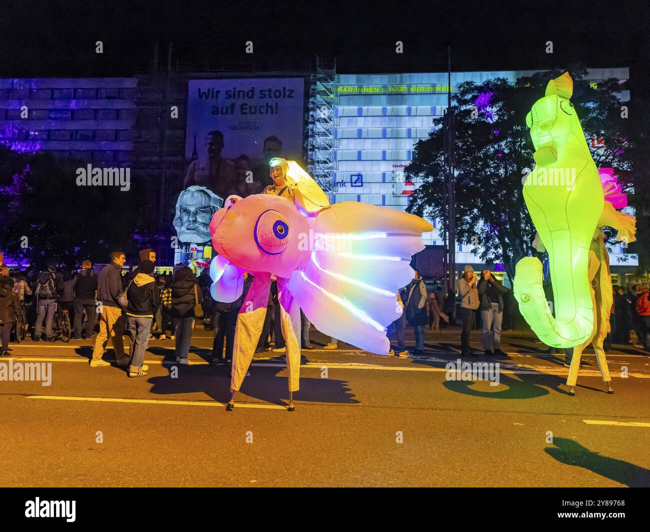 Walking act, underwater, stilt artists float gracefully across the ...