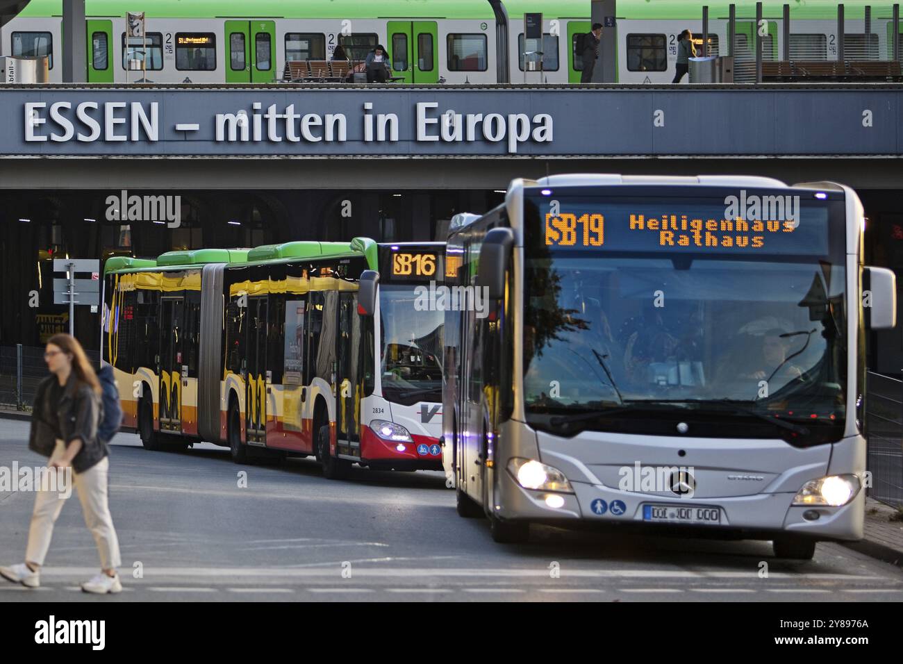 Essen public transport buses at Essen central station with local train ...