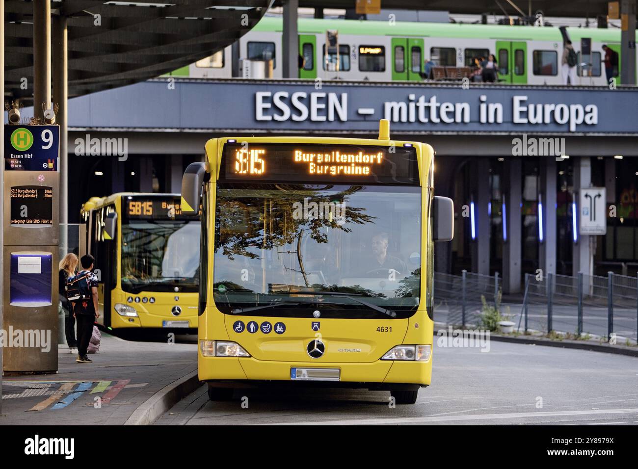 Essen public transport buses at Essen central station with local train ...
