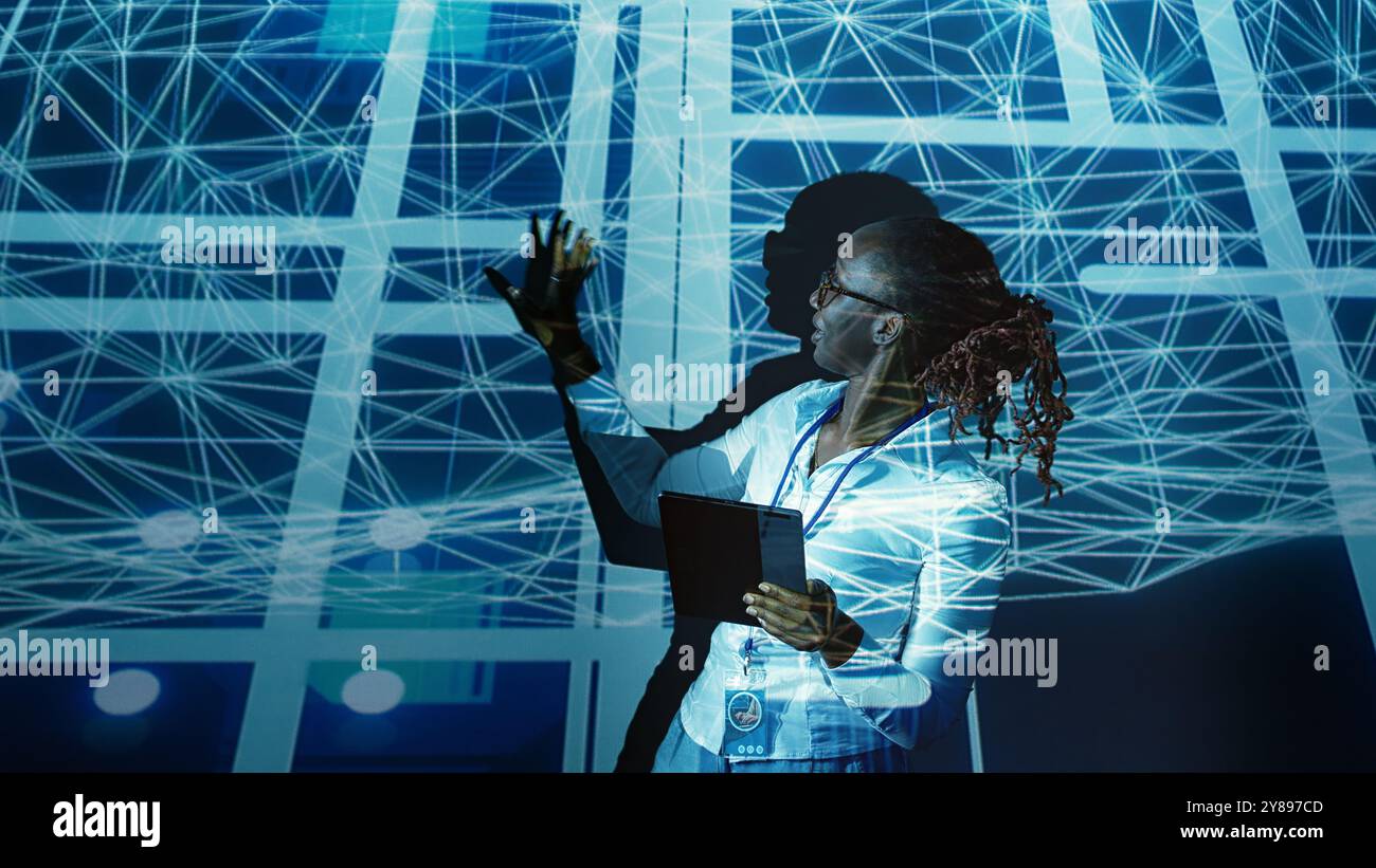 Computer scientist programming in AI server farm housing advanced ...