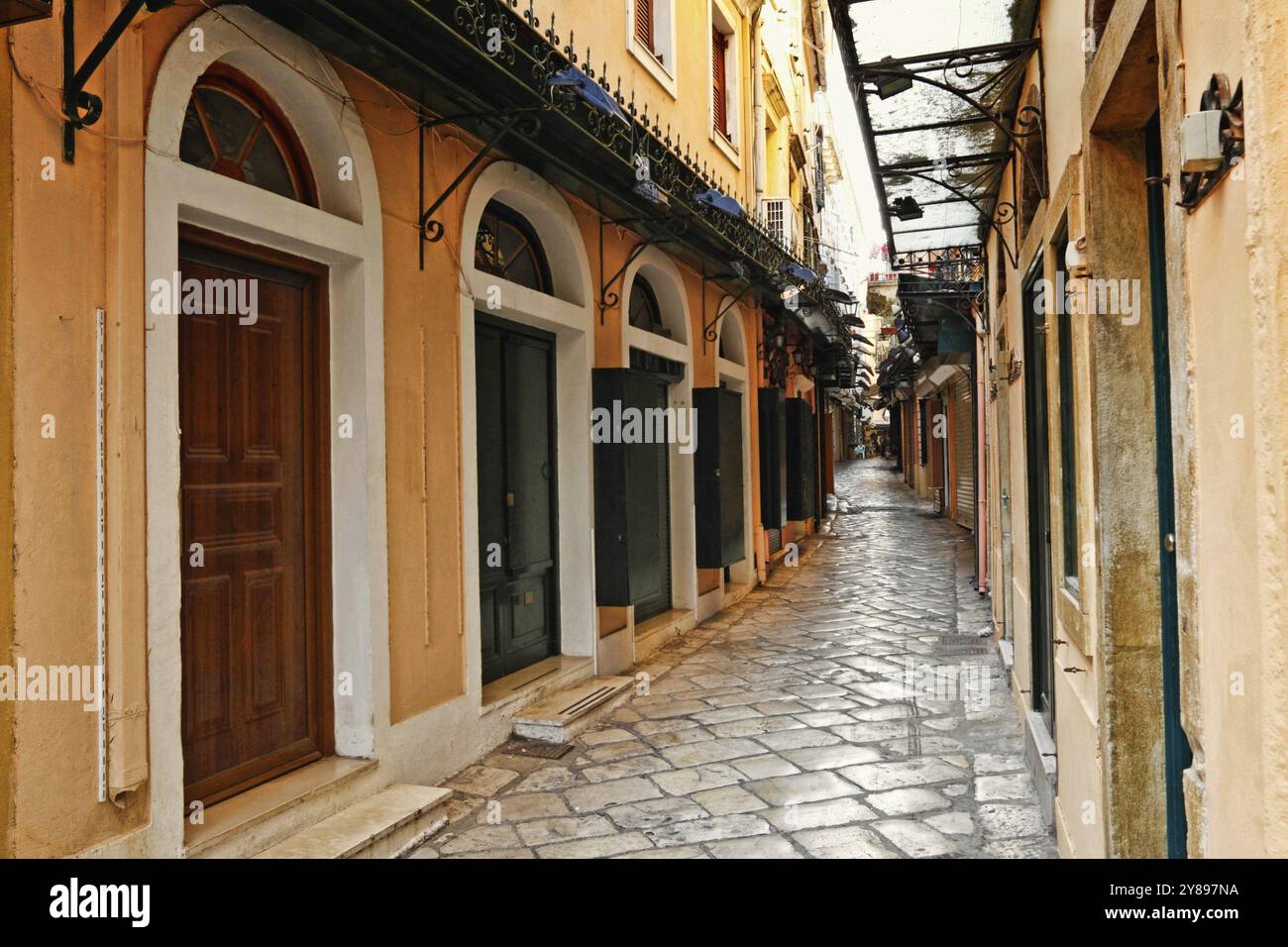 The famous alleyways (kantounia) in the old town of Corfu, Greece ...