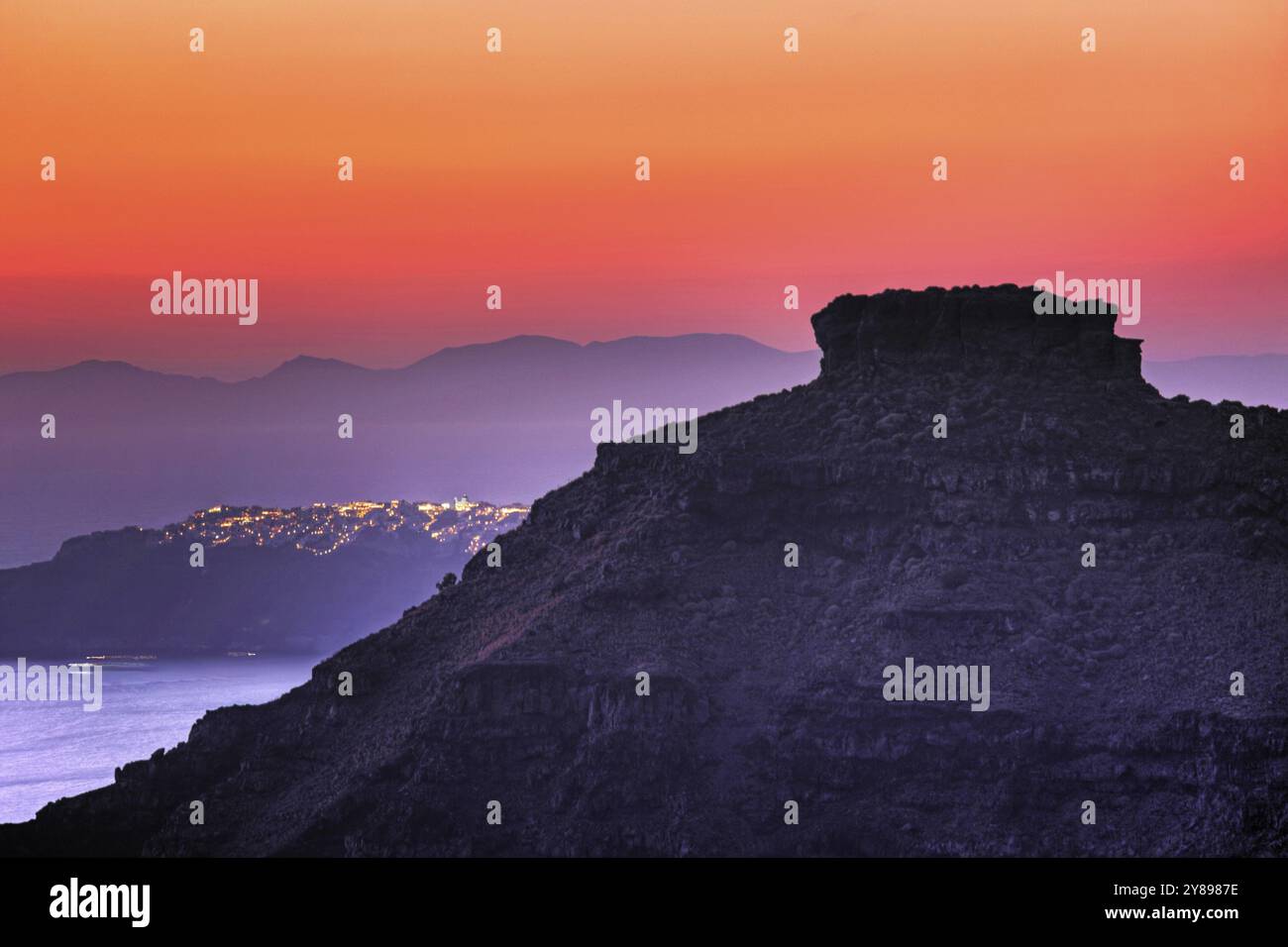 The famous skaros at sunset in Santorini, Greece, Europe Stock Photo ...
