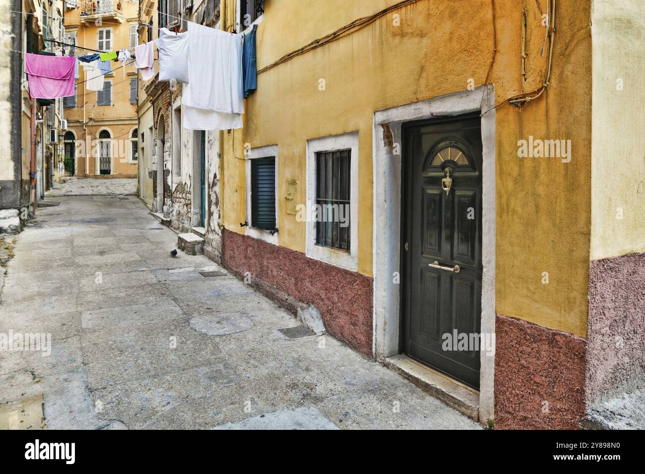 The famous alleyways (kantounia) in the old town of Corfu, Greece ...