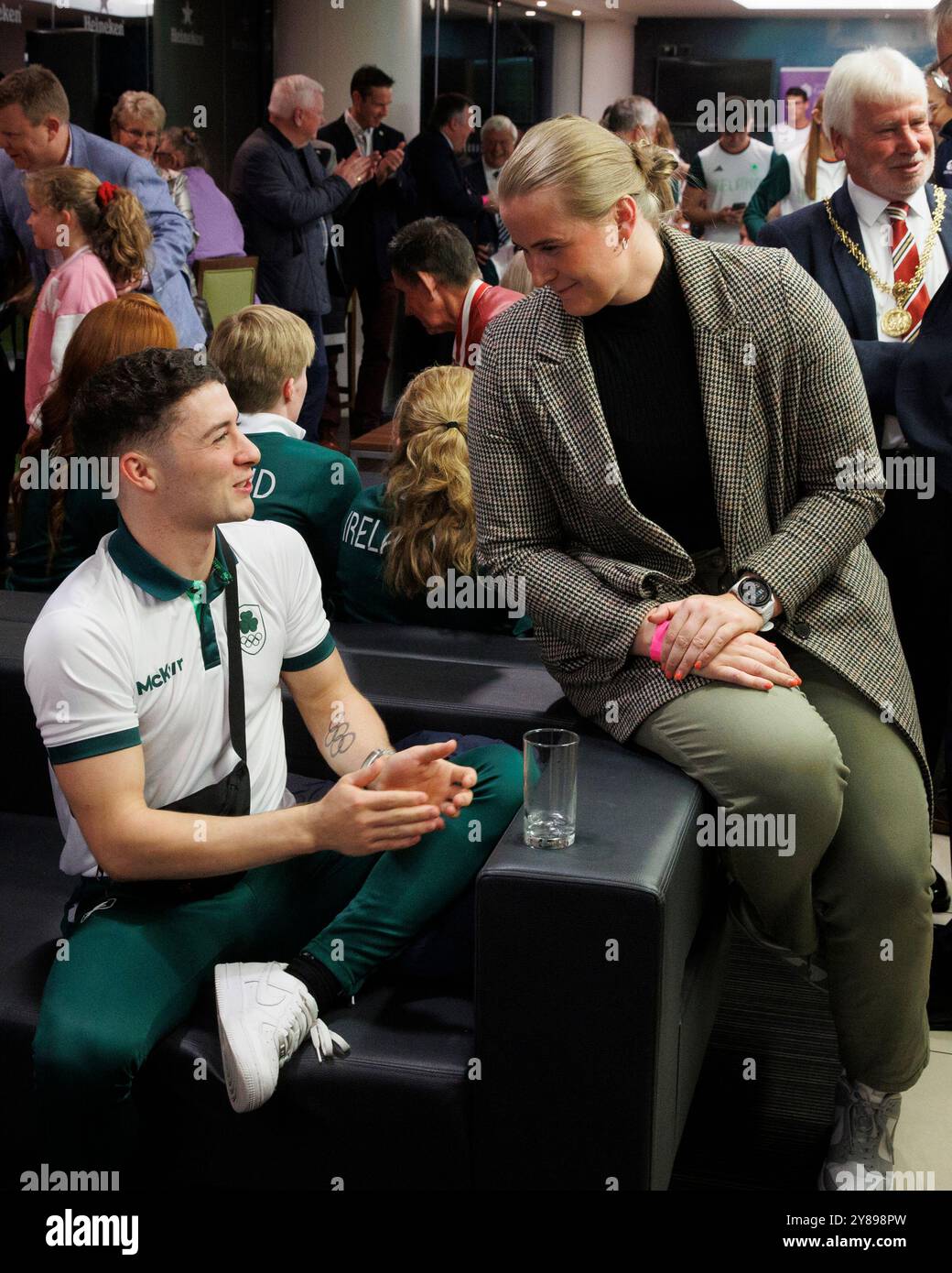 Paris 2024 gold medallist Rhys McClenaghan (left) with Junior Minister ...