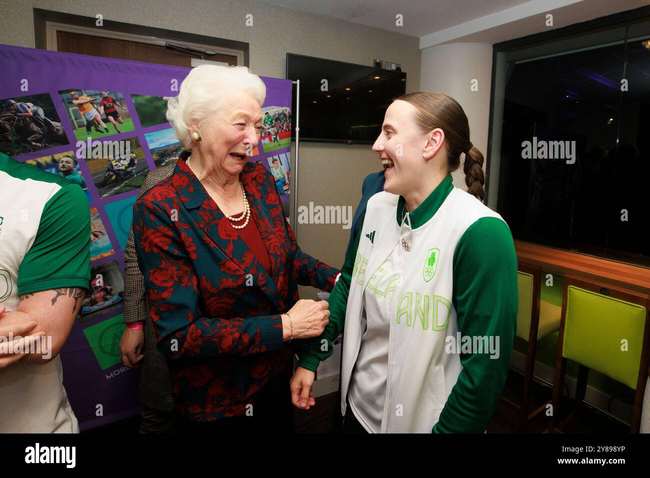 Dame Mary Peters (left) speaking with boxer Michaela Walsh during a ...