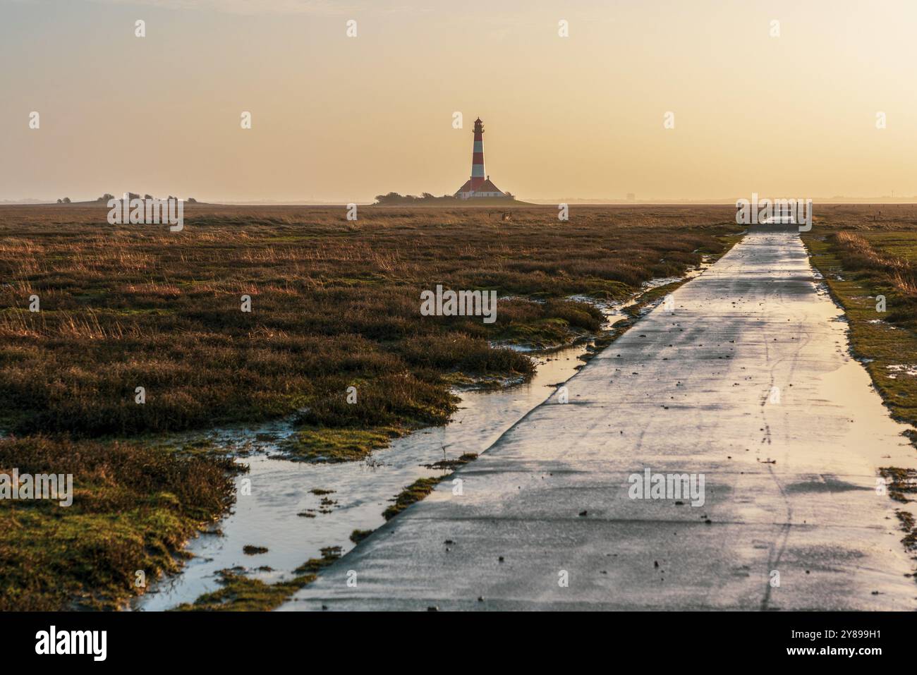 Westerheversand lighthouse on the North Sea a landmark of the ...