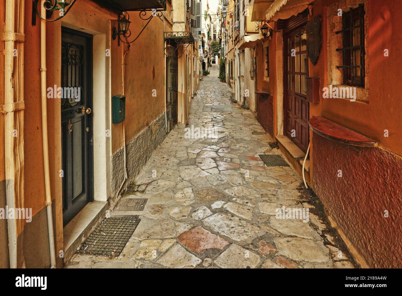 The famous alleyways (kantounia) in the old town of Corfu, Greece ...