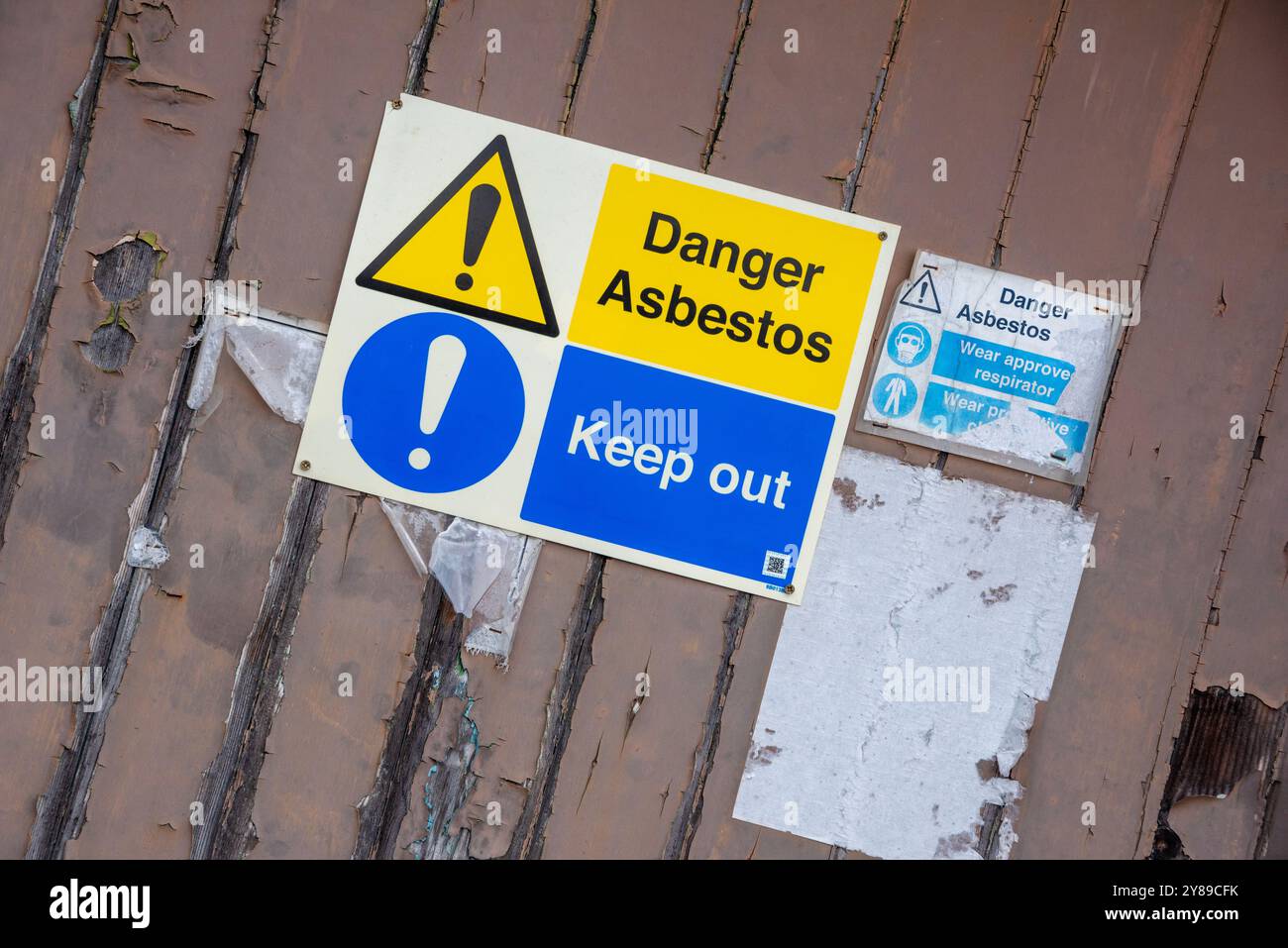 Asbestos warning signs, Bletchley Park campus, Milton Keynes, UK Stock ...