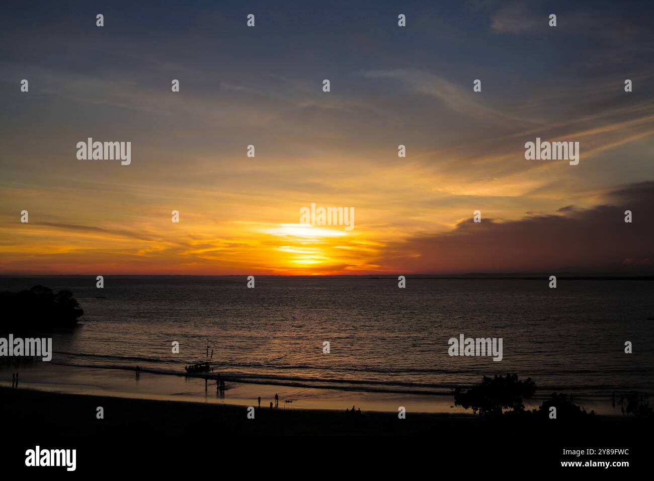 sunset on the beach pangandaran West Java Indonesia Stock Photo - Alamy