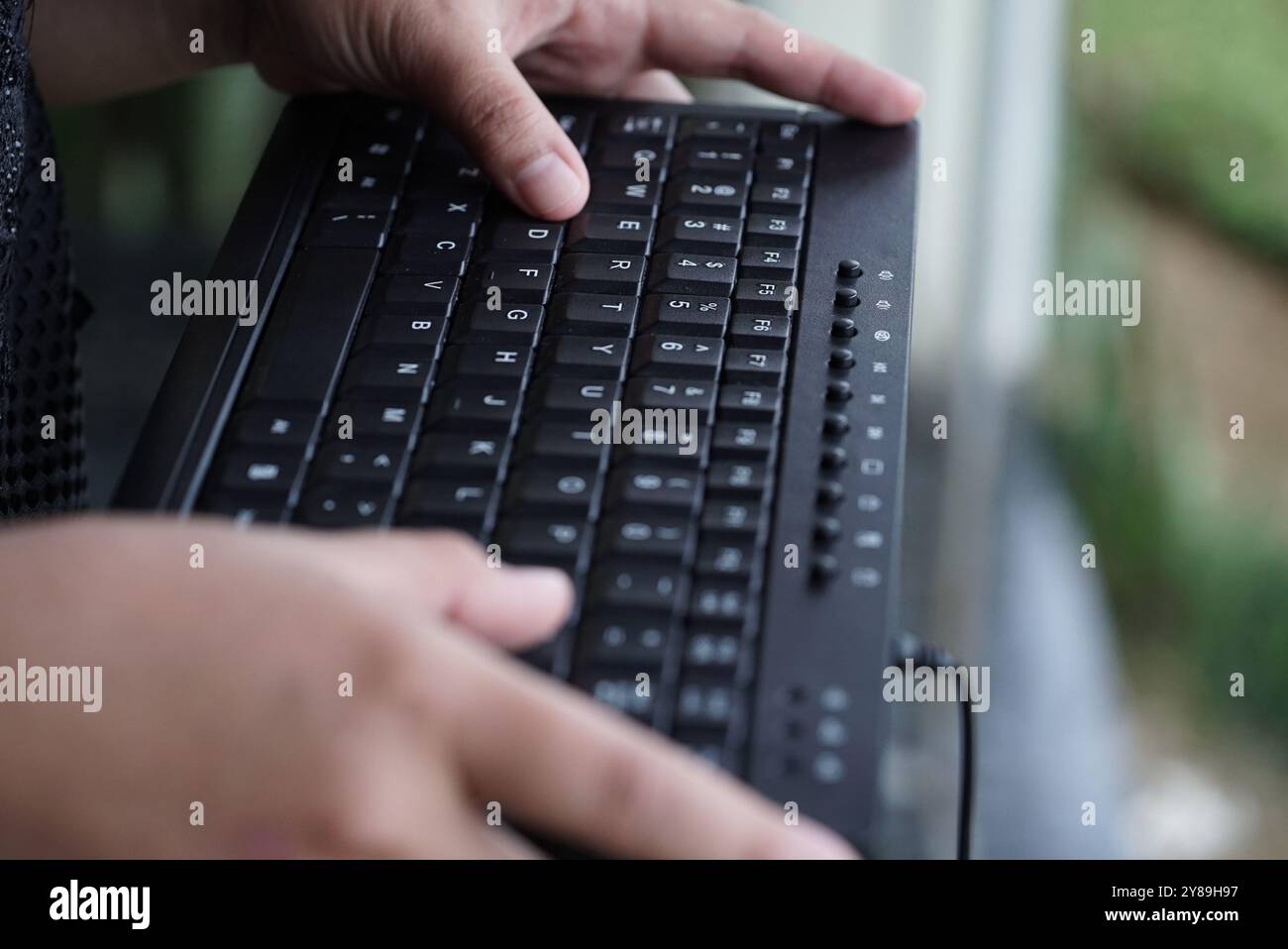 people work with keyboards Stock Photo - Alamy