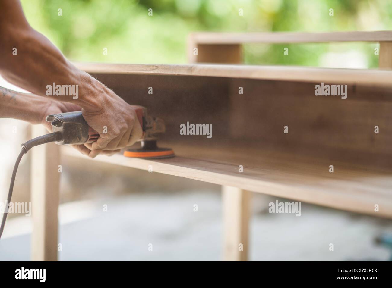carpenters work smoothing wood with a machine Stock Photo - Alamy