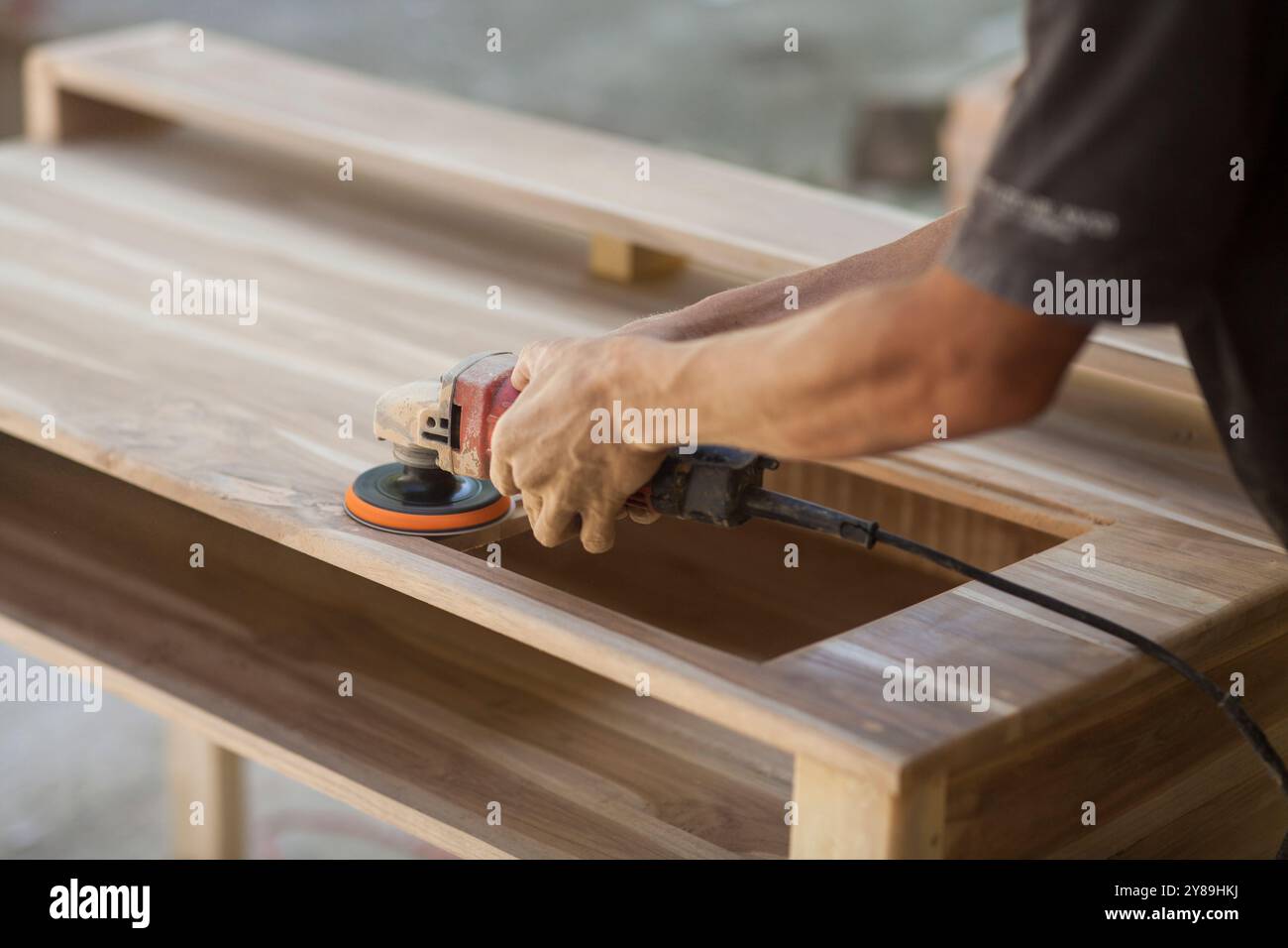 carpenters work smoothing wood with a machine Stock Photo - Alamy