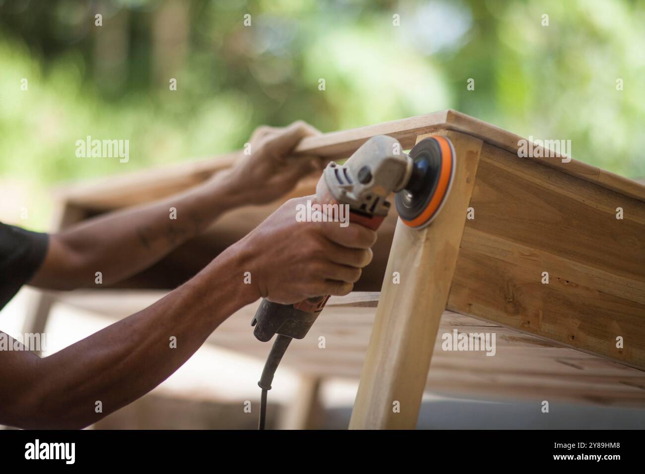 carpenters work smoothing wood with a machine Stock Photo - Alamy