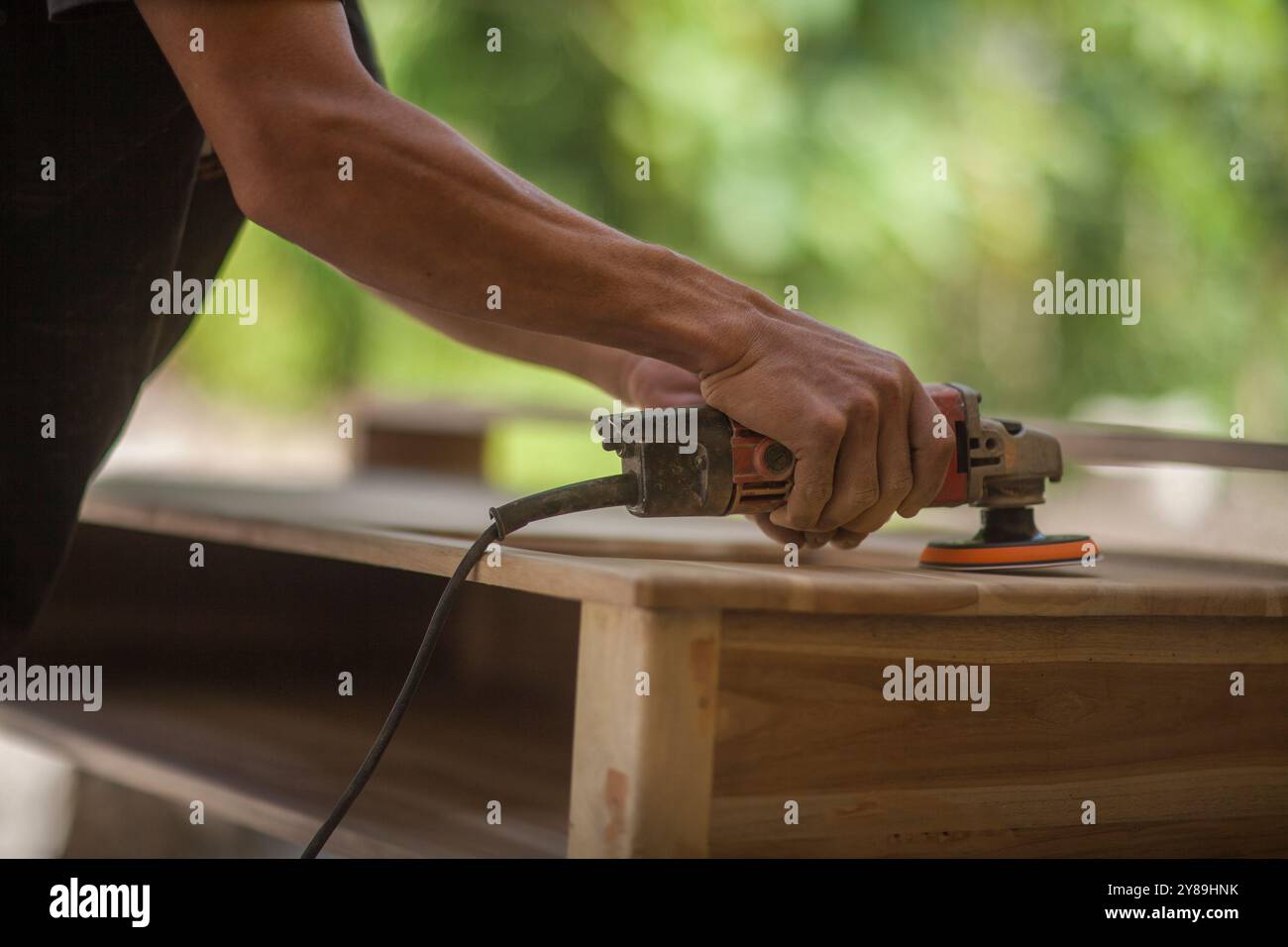 carpenters work smoothing wood with a machine Stock Photo - Alamy