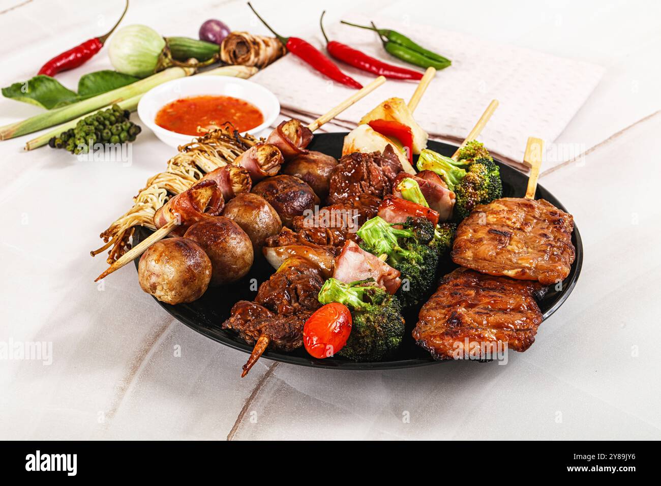 Asian grilled skewer assortment satay with beef, porl, chicken and ...