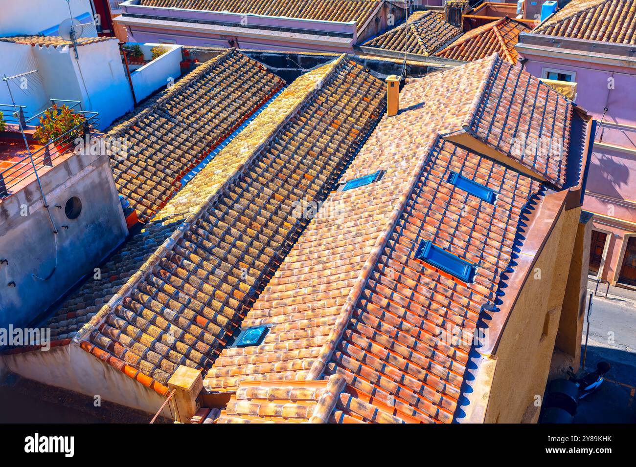 Overhead perspective of a tiled roofs. Old town charming view from ...