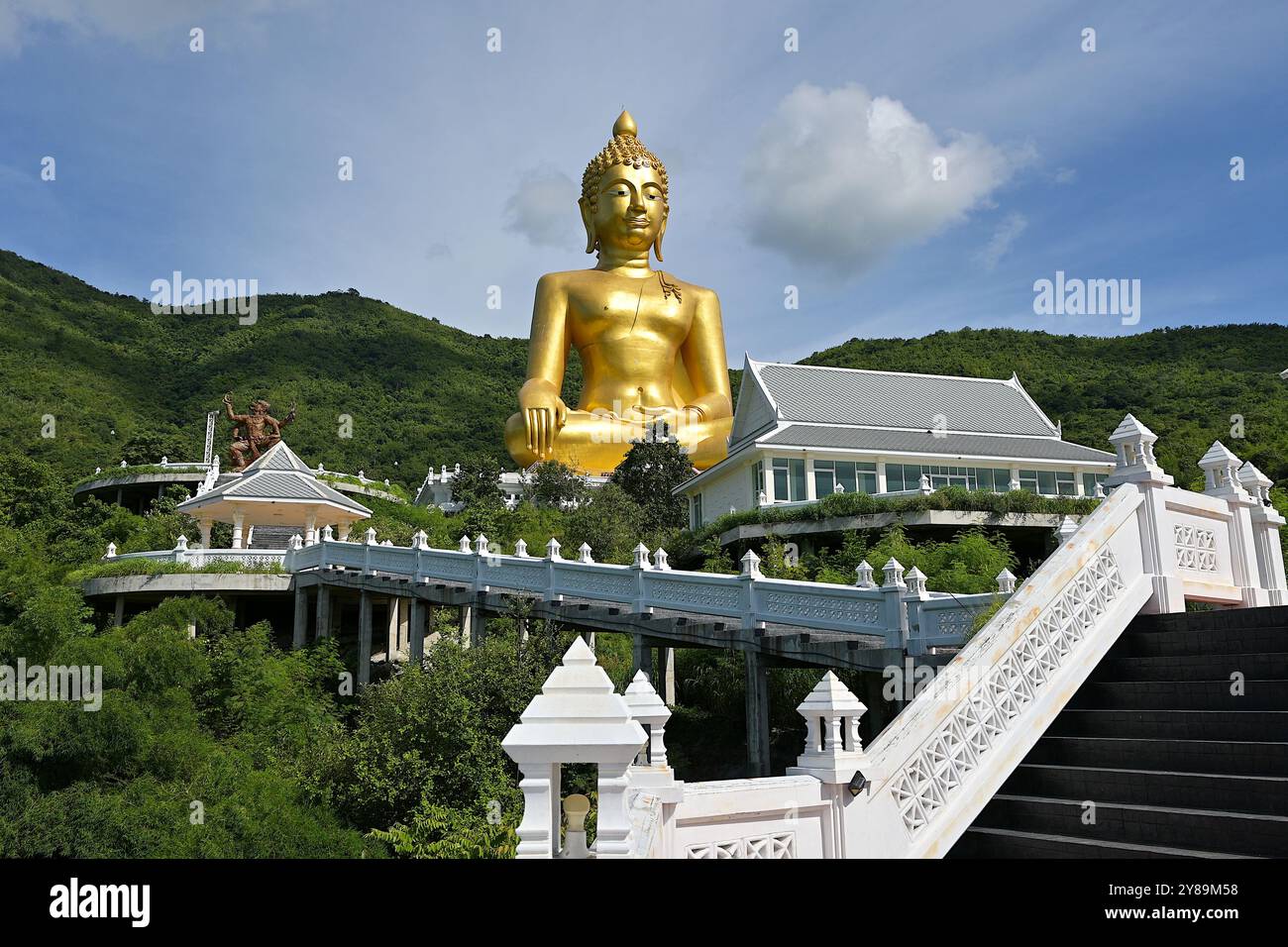 Steps leading to the giant golden Big Buddha statue at Wat Khao Wong ...
