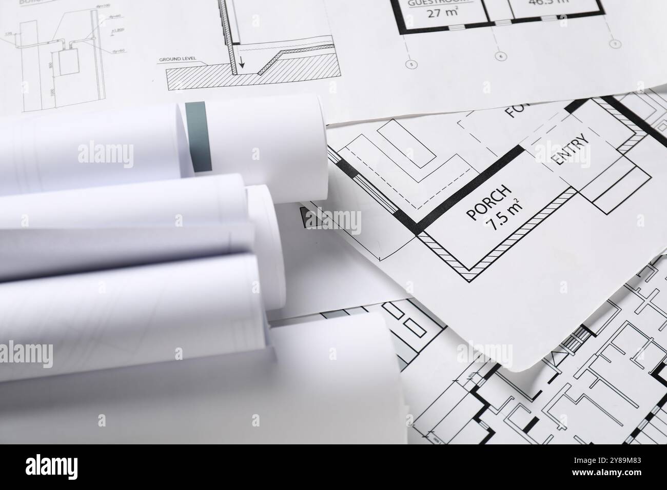 Different architectural drawings on table, closeup view Stock Photo - Alamy