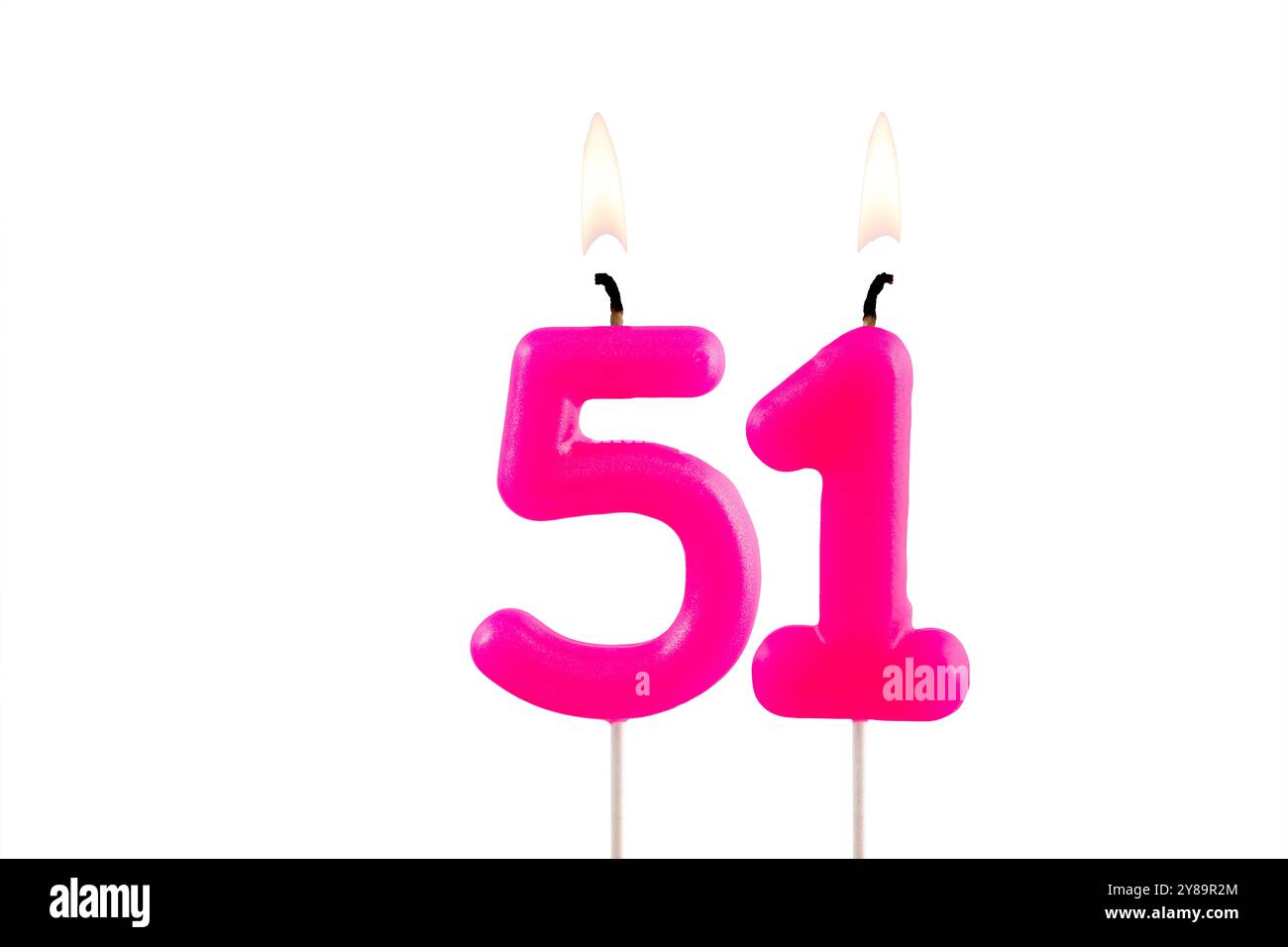 Pink number 51 birthday candle on white background Stock Photo - Alamy