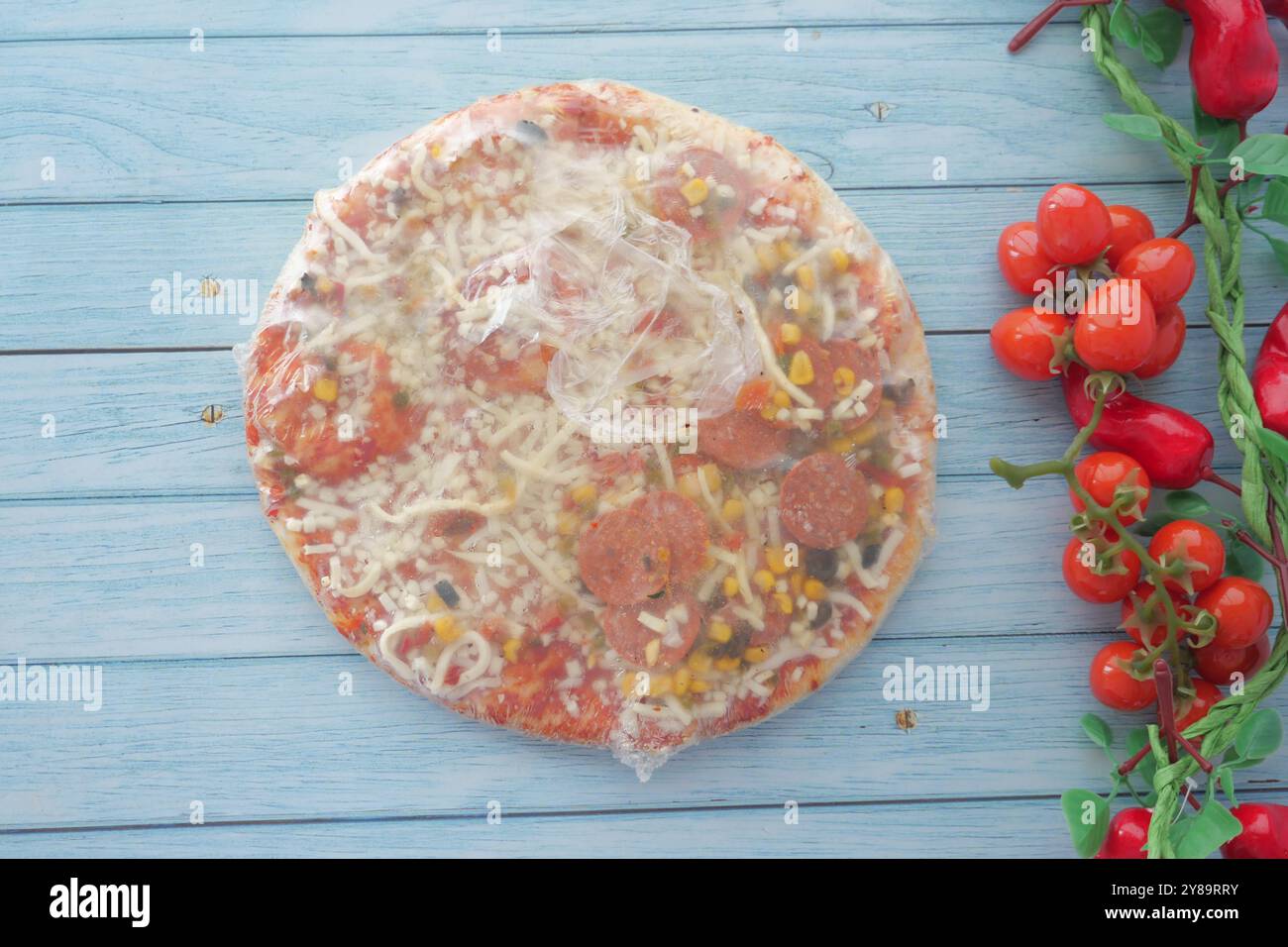 Delicious Frozen Pizza Featuring Cheese and Various Toppings, All ...