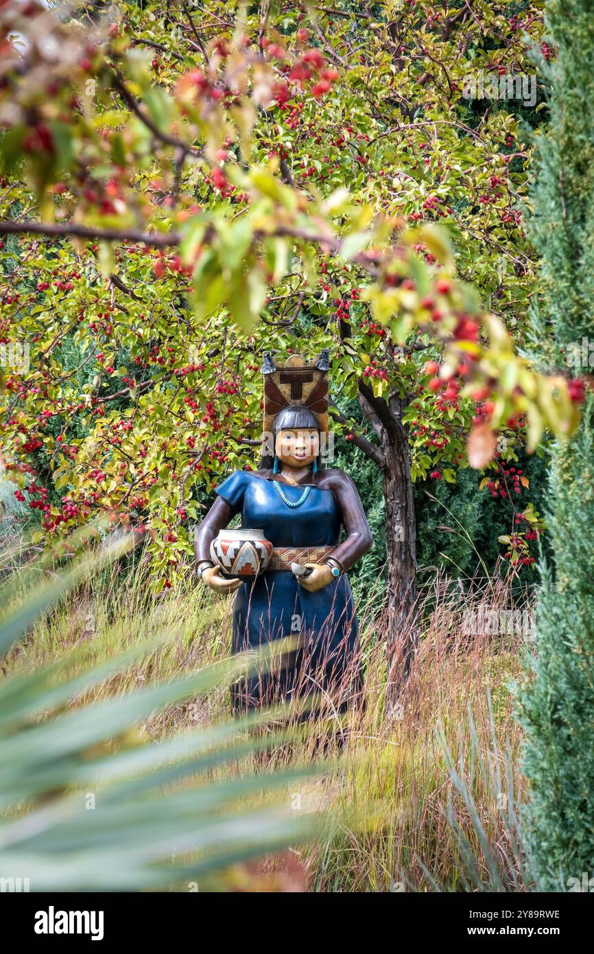 A statue of a Native American woman at the Santa Fe Botanical Garden ...