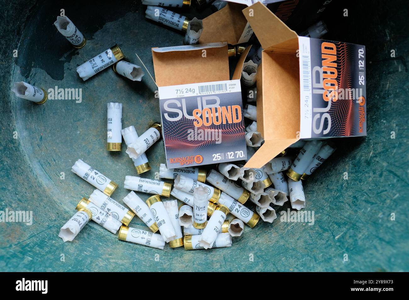 Empty, spent, discarded, fired shotgun shell cartridges used for clay ...