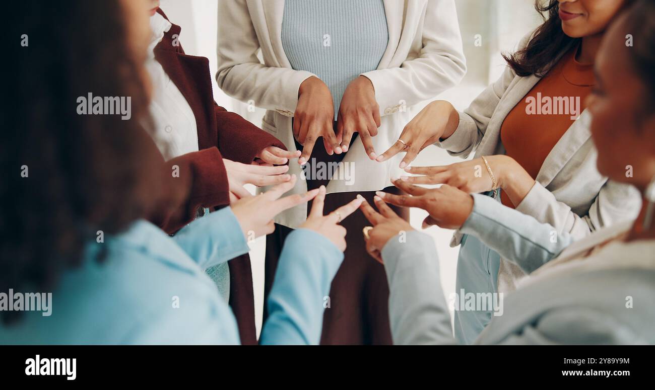 Business people, circle and hands together for cooperation, women and ...