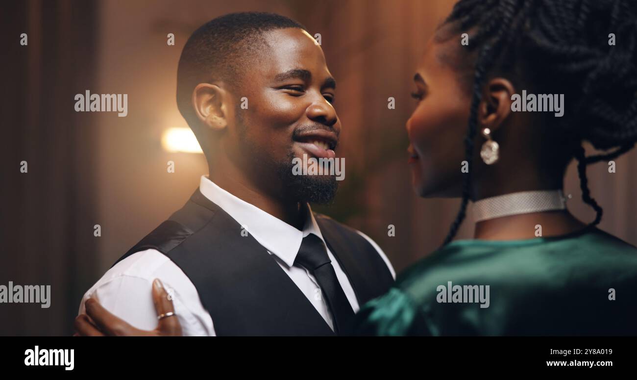 Black couple, dancing and happy at event, night and together at charity ball with care, love and ...