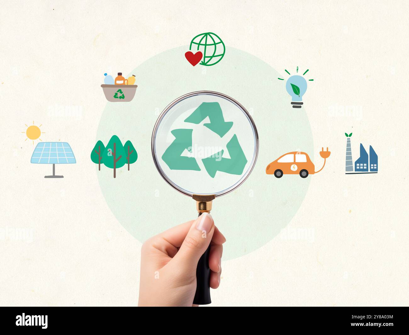 Hand holding magnifying glass focus to green recycling icon, surrounded ...