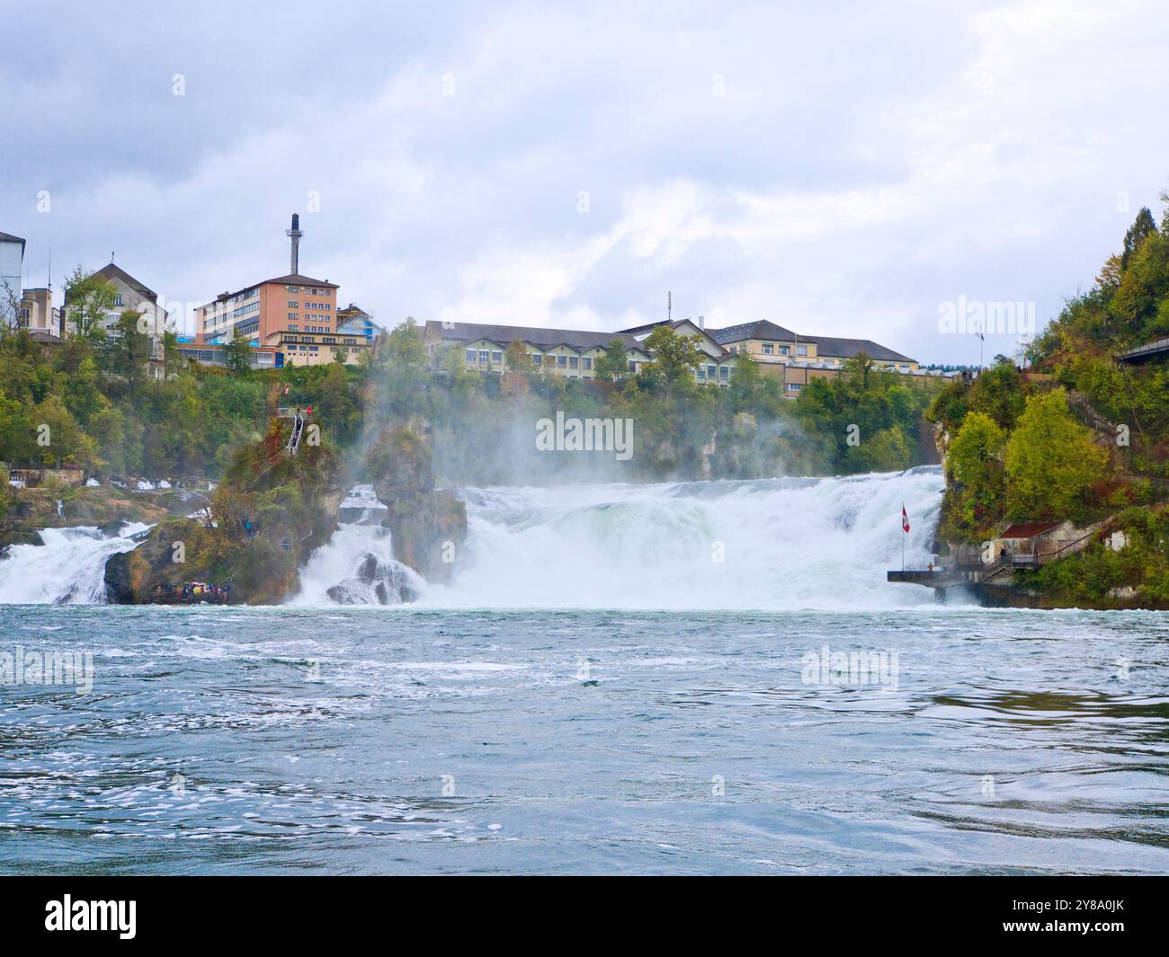 The Rhine Falls is the largest plain waterfall in Europe, near the town ...