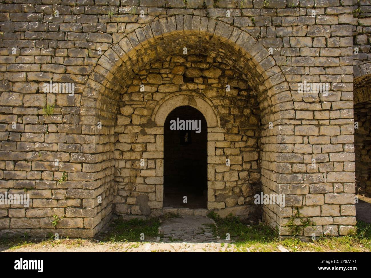An arched doorway in part of the fortified gallery walls of the 13th century Berat Castle ...