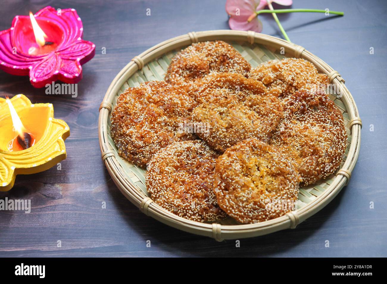 Anarsa is a popular Indian sweet made from rice, sugar, ghee, and poppy ...
