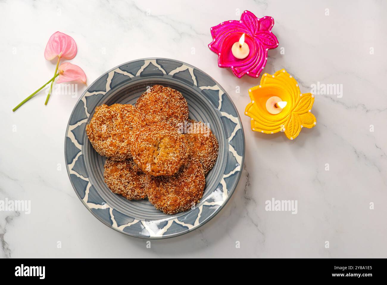 Anarsa is a popular Indian sweet made from rice, sugar, ghee, and poppy ...