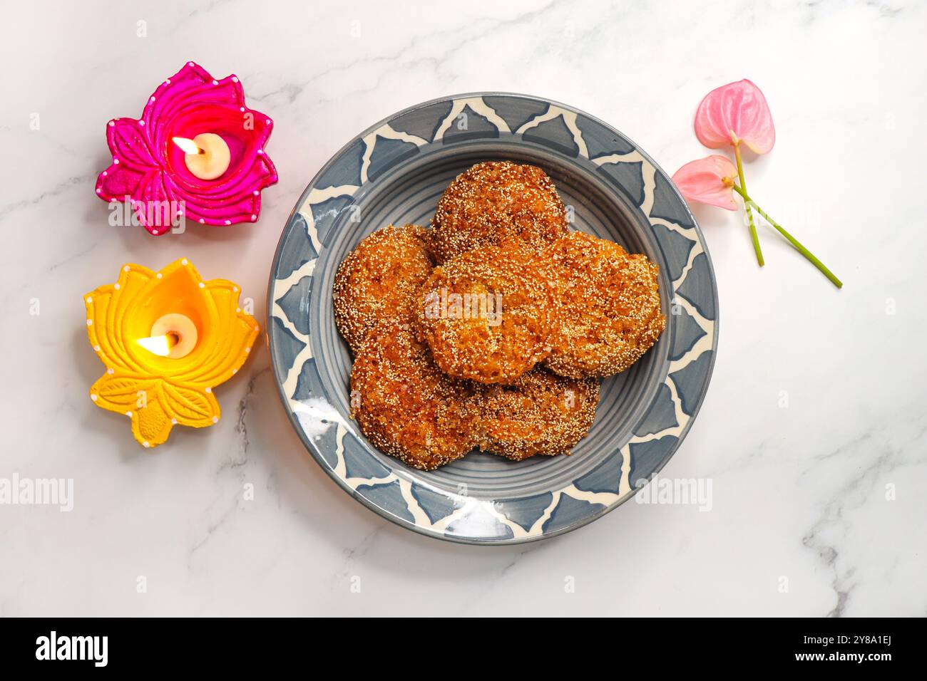 Anarsa is a popular Indian sweet made from rice, sugar, ghee, and poppy ...