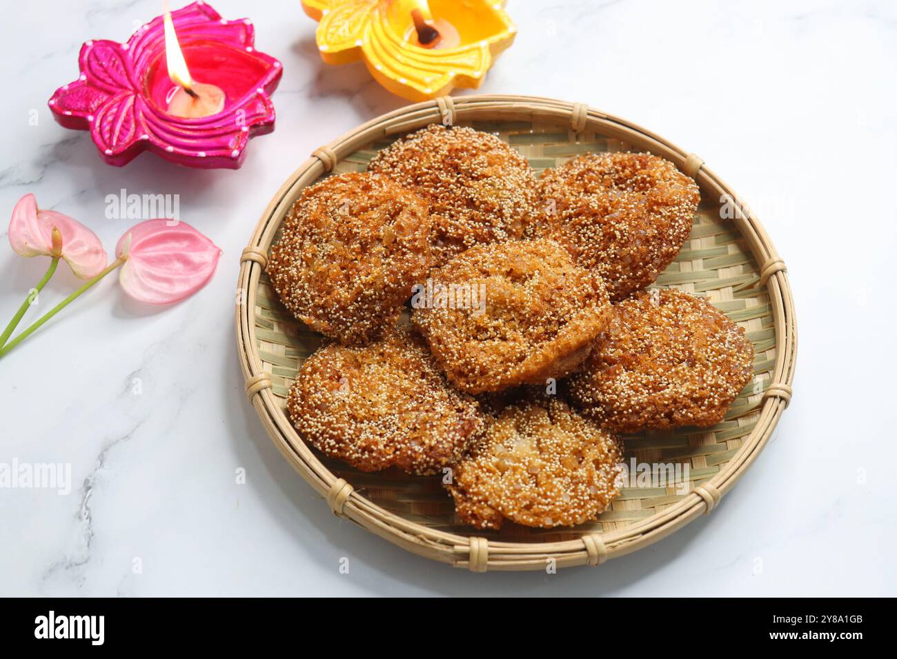 Anarsa is a popular Indian sweet made from rice, sugar, ghee, and poppy ...