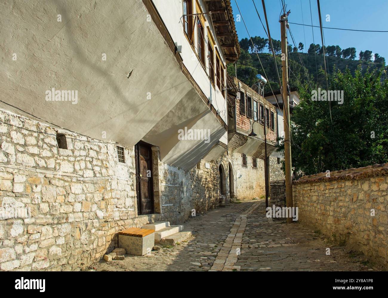 An historic house with half-timbered jettying overhanging a lane in the ...