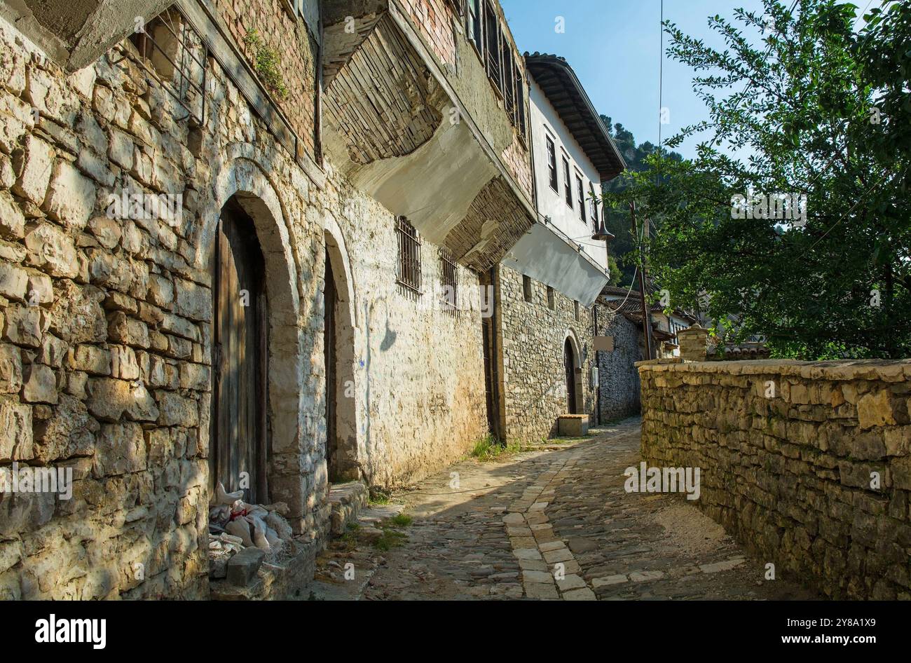 An historic house with half-timbered jettying overhanging a lane in the ...