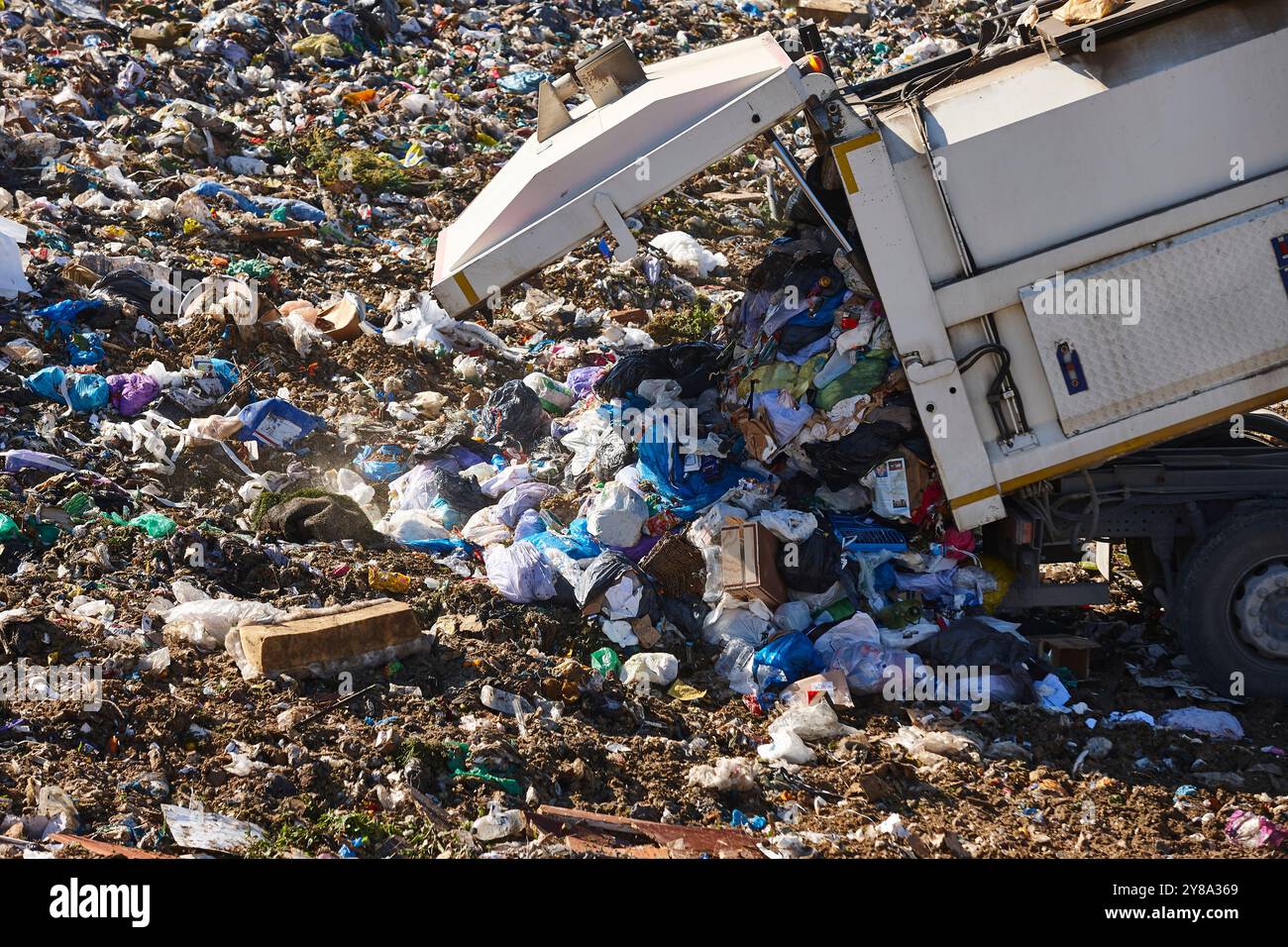 Truck unloading garbage on an open air dump. Waste recycling Stock ...