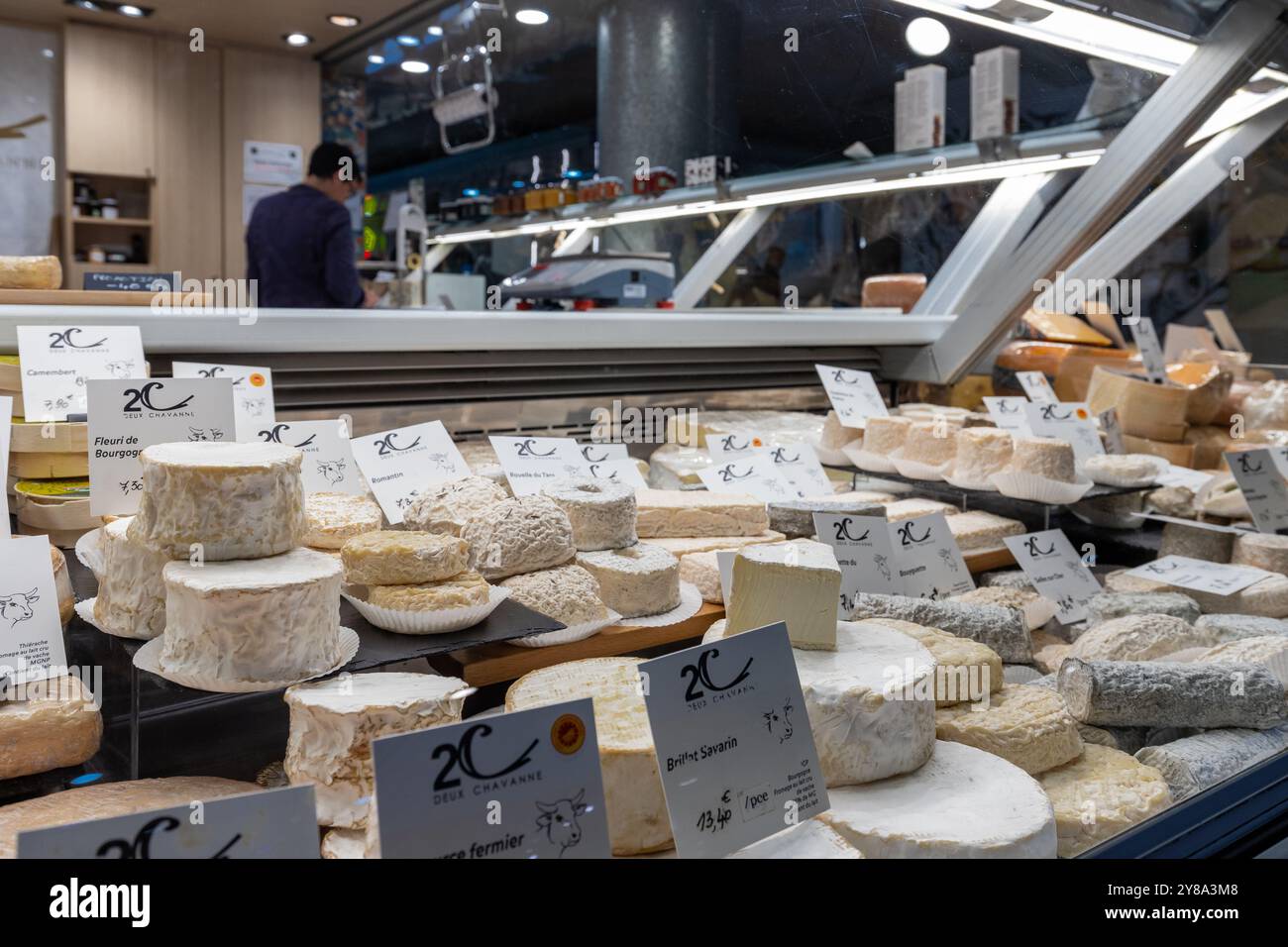 Cheese display in one of the many covered markets in Toulouse which is ...