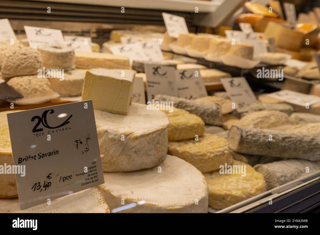 Cheese display in one of the many covered markets in Toulouse which is ...