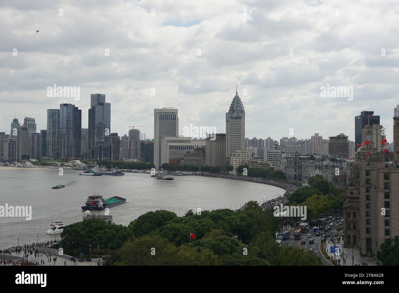 SHANGHAI, CHINA - OCTOBER 4, 2024 - Tourists visit the Bund in Shanghai ...