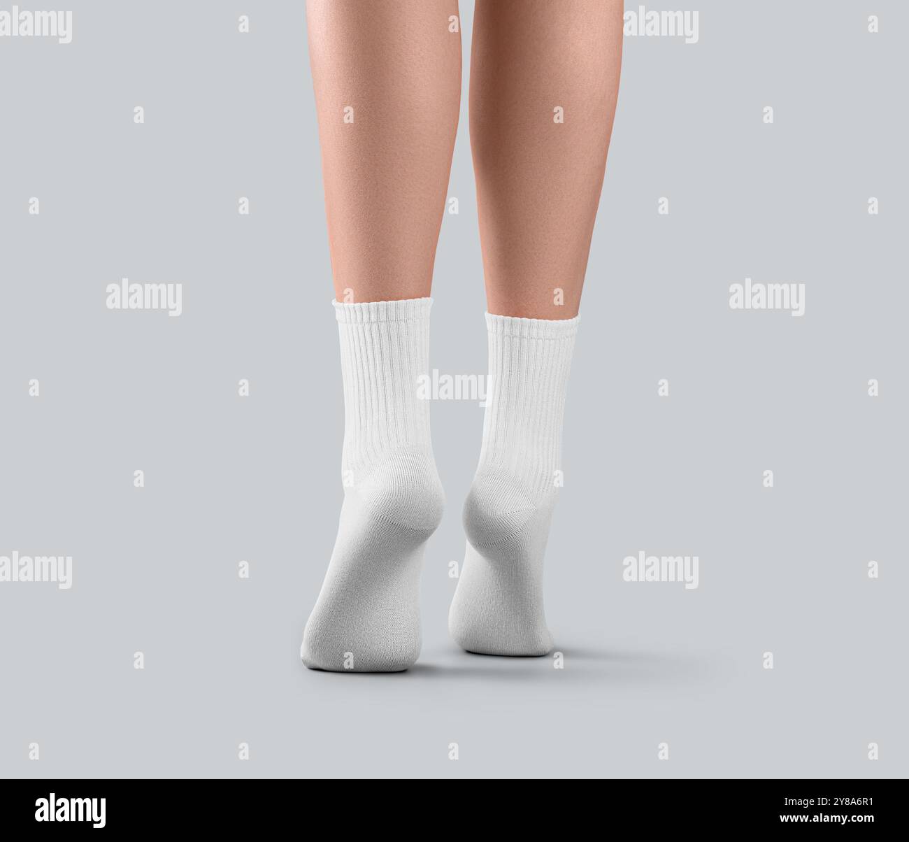 Mockup of white medium socks on women's feet on tiptoes, for design ...