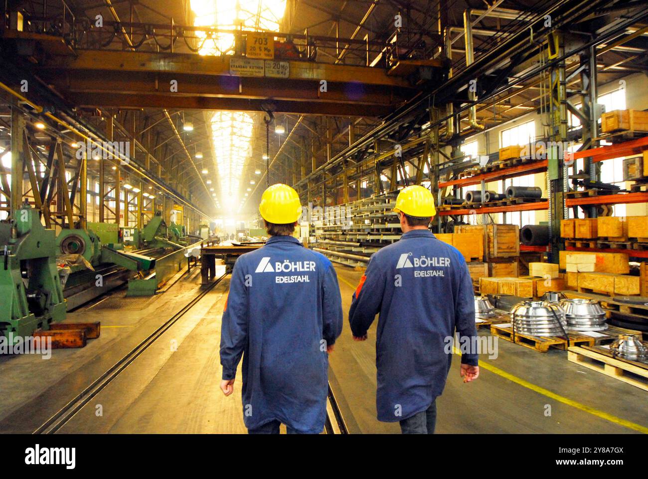 working and producing in a plant in the iron industry working in the ...