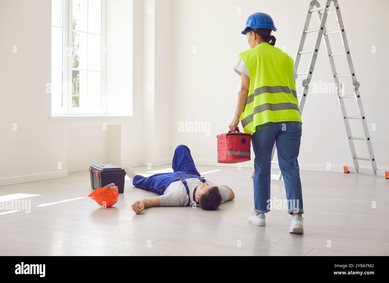 Woman worker finds builder or repairman who collapsed unconscious on ...