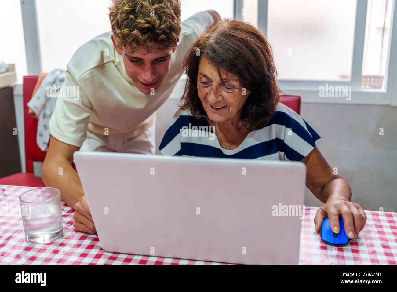 Teenager Teaching His 70-Year-Old Grandmother to Use a Laptop, Bridging ...