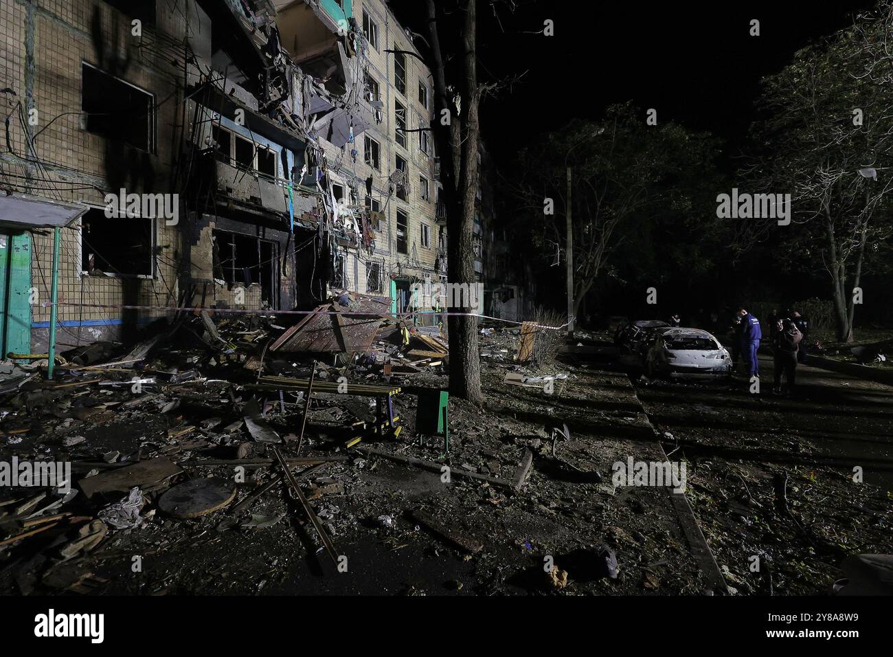 KHARKIV, UKRAINE - OCTOBER 03, 2024 - A residential building damaged by ...