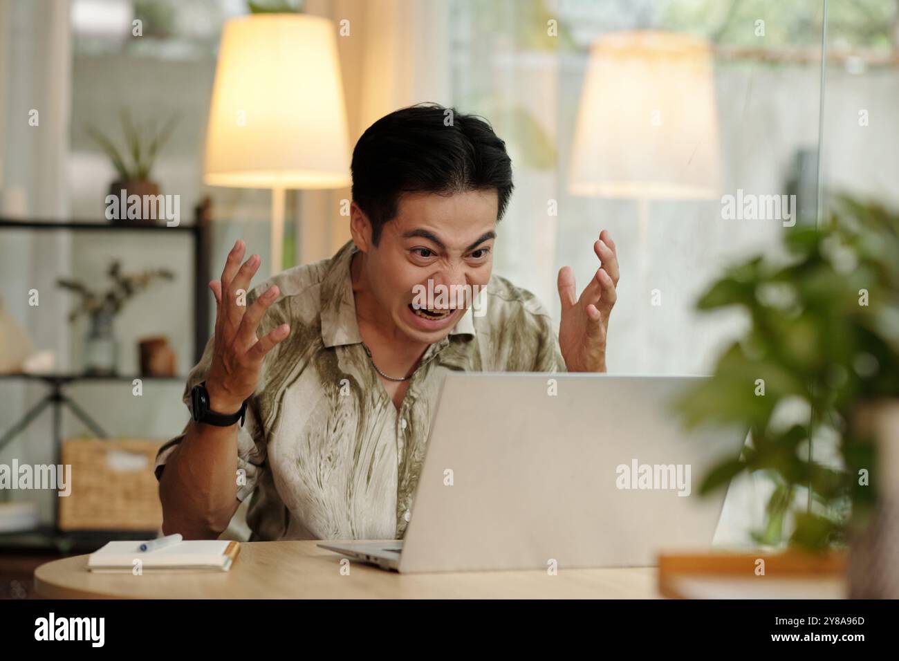 Angry Man Crazy About His Work Stock Photo - Alamy