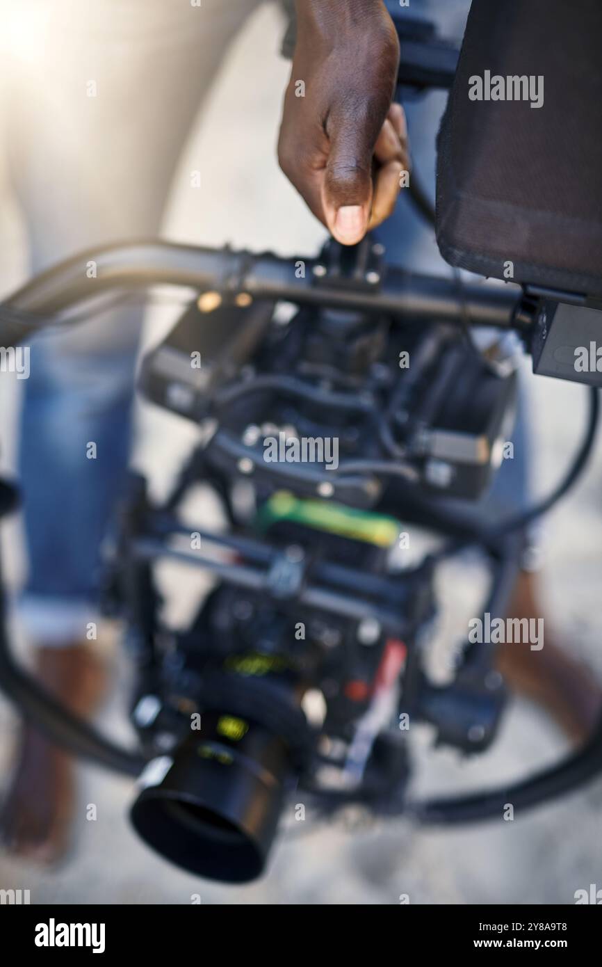 Videographer, hand and video camera for photoshoot results, content ...